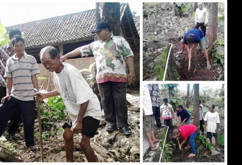 Penanaman Patok Batas Balai Desa